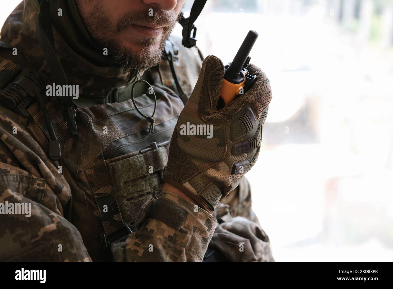 Military mission. Soldier in uniform with radio transmitter inside ...