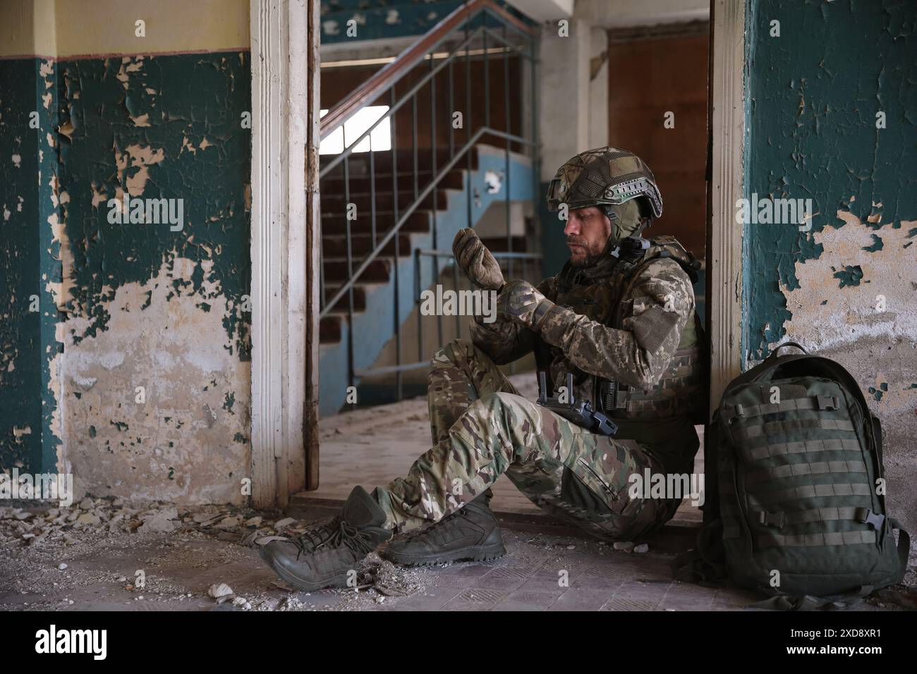 Military mission. Soldier in uniform with drone controller inside ...
