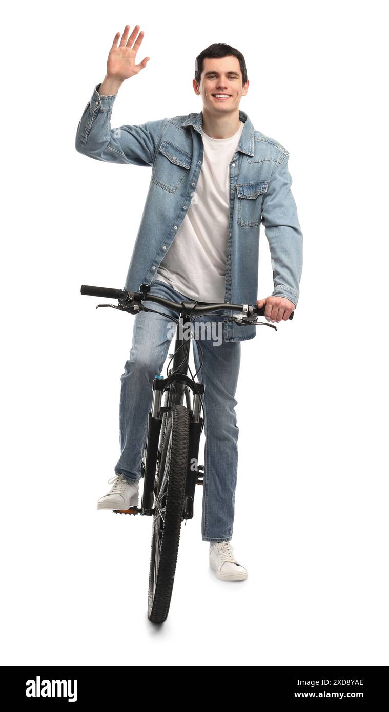 Young man riding wave Cut Out Stock Images & Pictures - Alamy