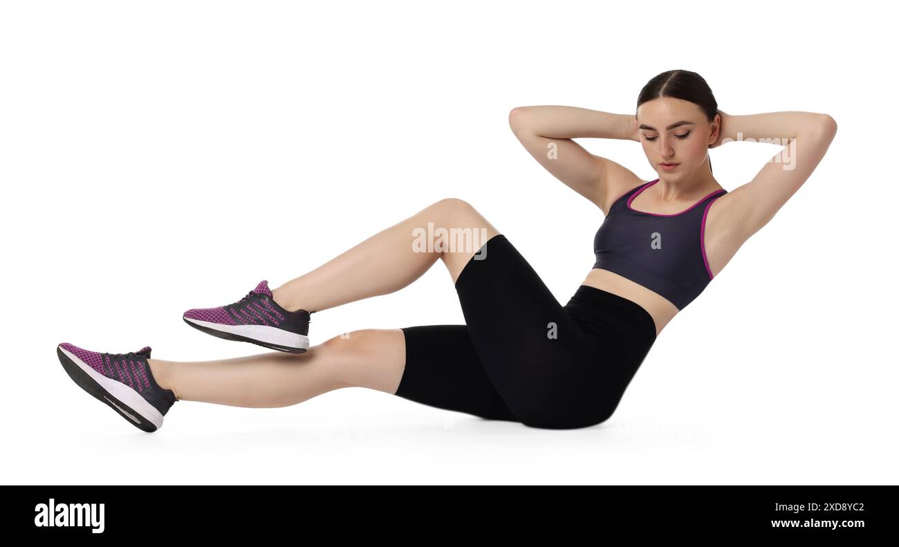 Young woman doing aerobic exercise on white background Stock Photo - Alamy