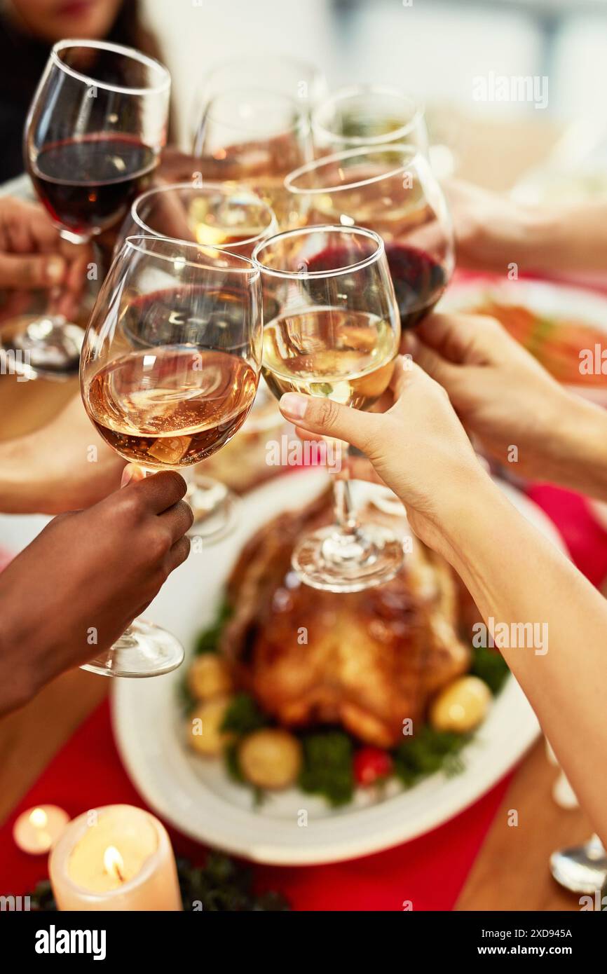 Christmas, food and friends toast with alcohol for dinner party ...