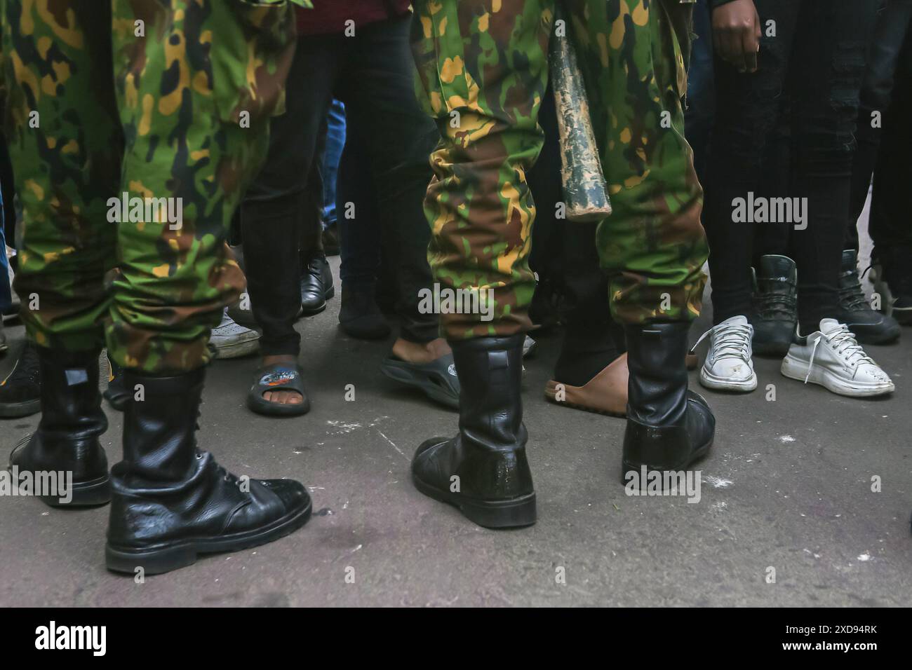 Nairobi, Kenya. 20th June, 2024. Police and protesters shoes during a ...