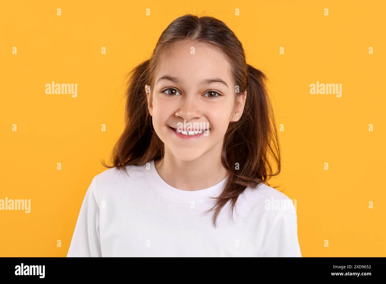 Happy school girl hairstyle hi-res stock photography and images - Alamy