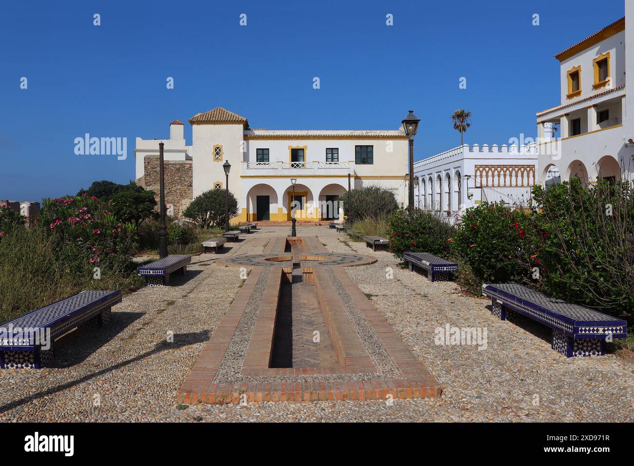 Cozy public square with benches tiled in Spanish style in town, Tarifa ...