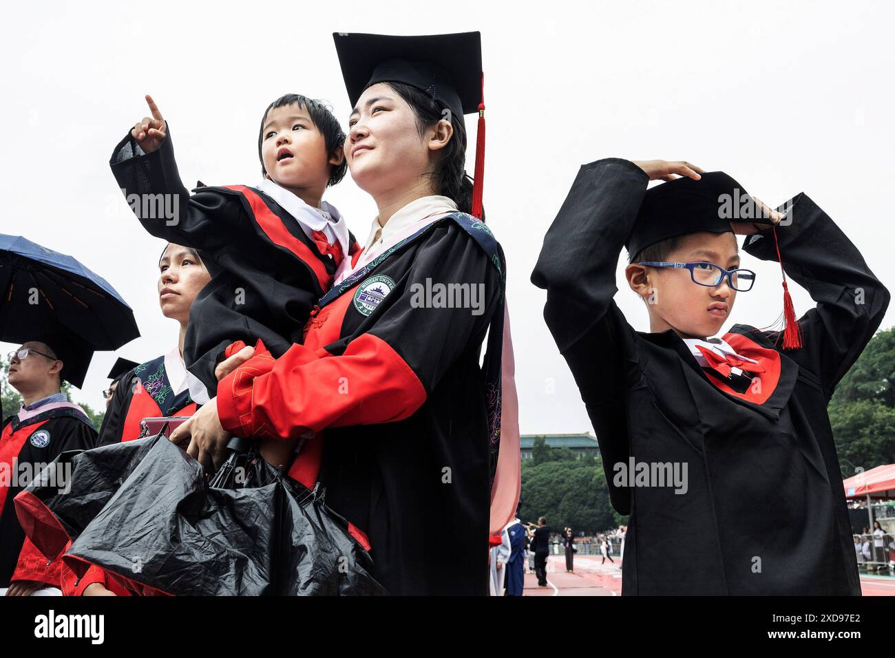 Wuhan, China. 20th June, 2024. A PhD student attends the graduation ...