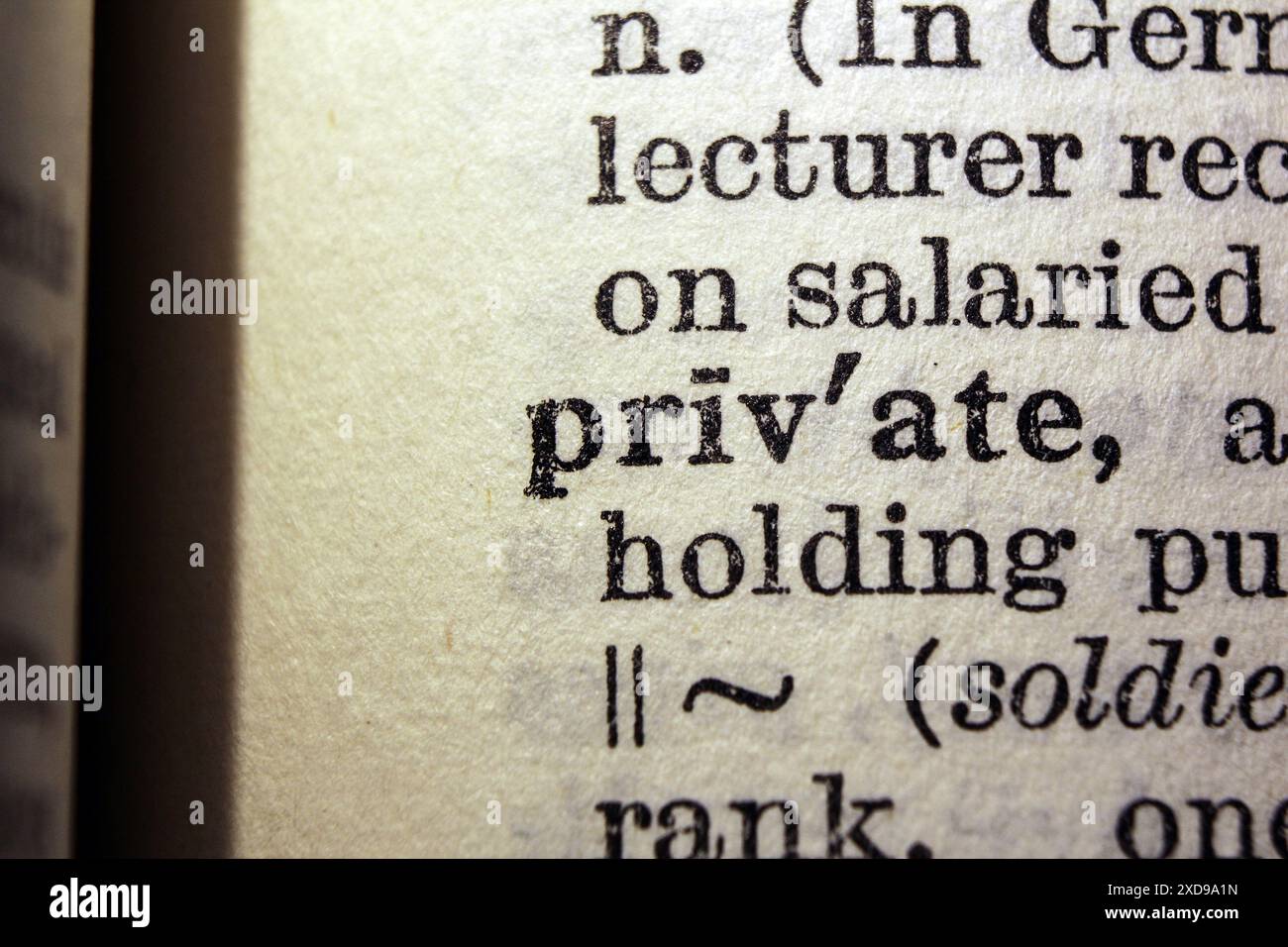 Word private on dictionary page, macro close-up Stock Photo - Alamy