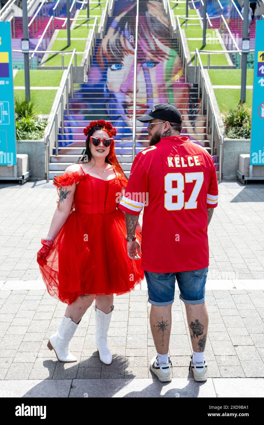 London, UK. 21 June 2024. Swiftie fans including a man wearing a Travis ...