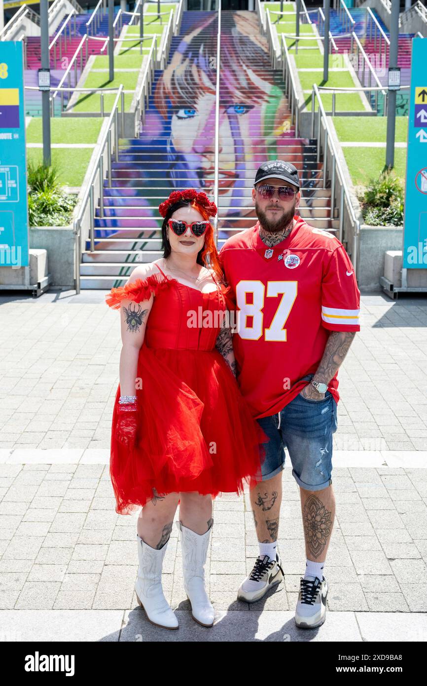 London, UK. 21 June 2024. Swiftie fans including a man wearing a Travis ...
