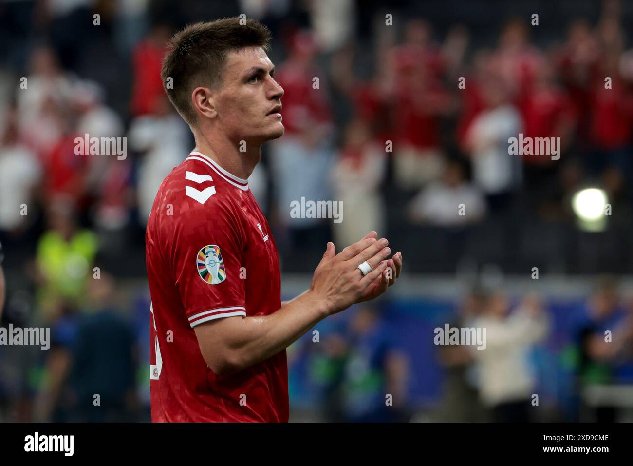 Joakim Maehle of Denmark salutes the supporters following the UEFA Euro ...