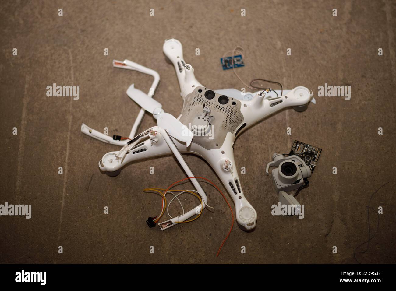 Fallen damaged quadcopter drone crash on a floor Stock Photo - Alamy