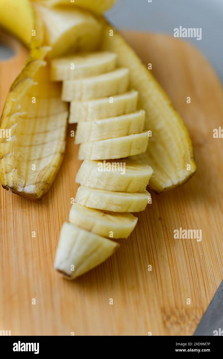Cutting peeled banana kitchen hi-res stock photography and images - Alamy