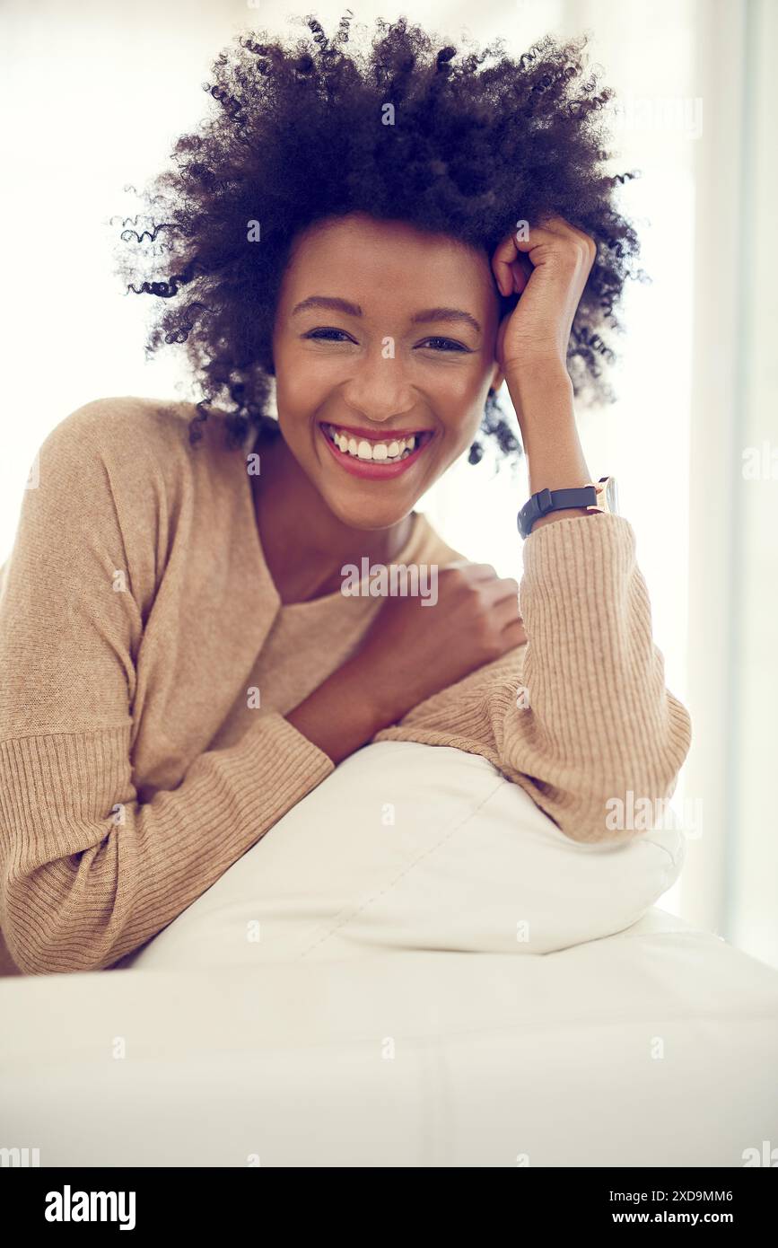 Laugh, happy and portrait of black woman in home for relaxing, chill ...