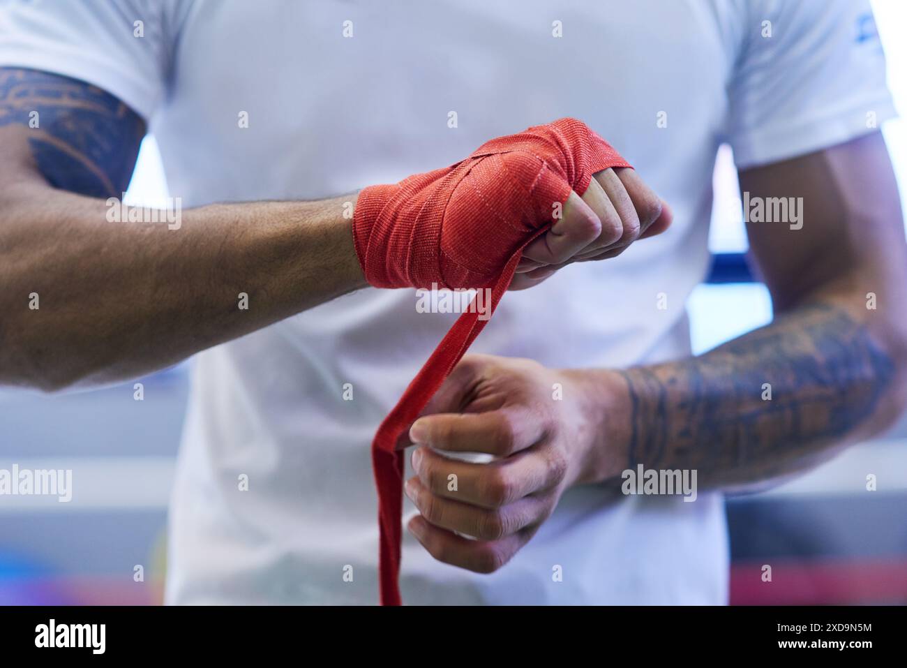 Ring, boxer or man wrapping hands for training, exercising and workout ...