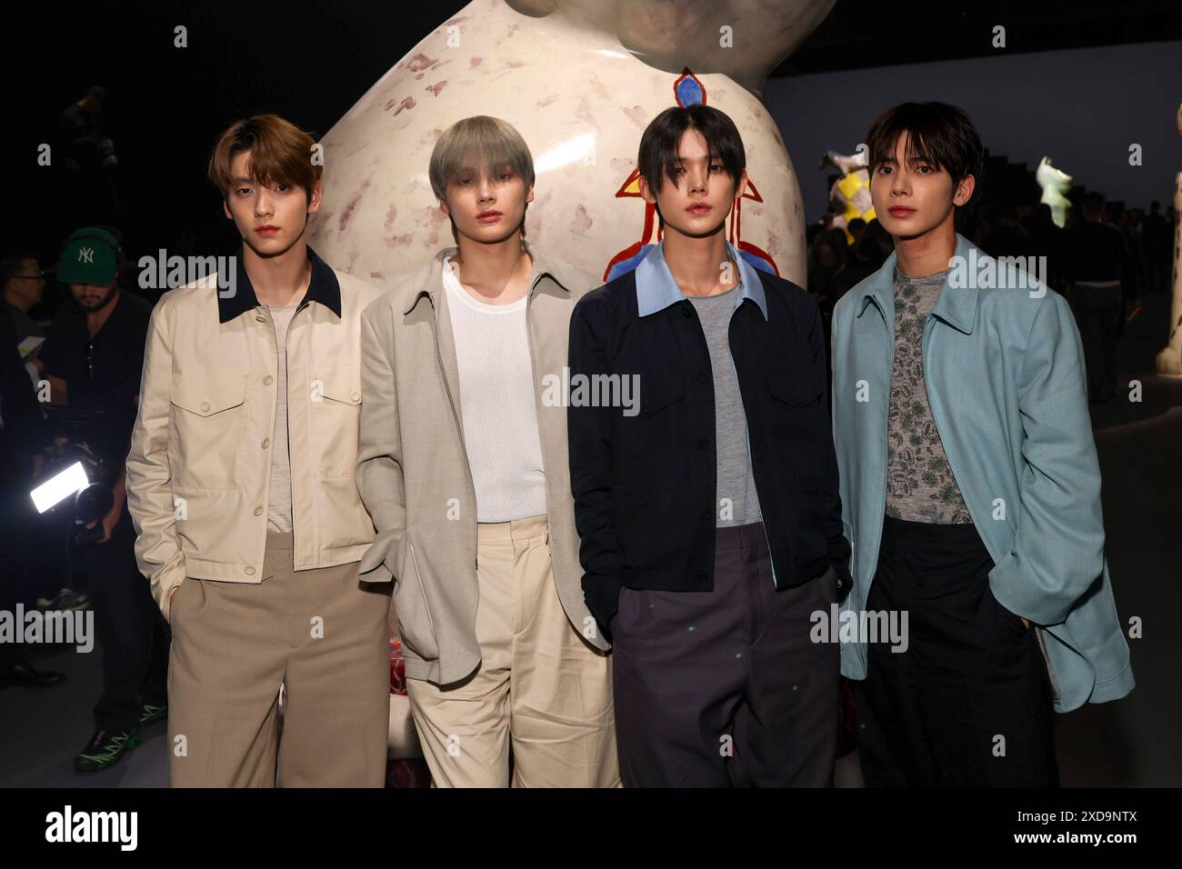 Soobin, from left, Huening Kai, Yeonjun, and Taehyun attend the Dior Spring Summer 2025 ...