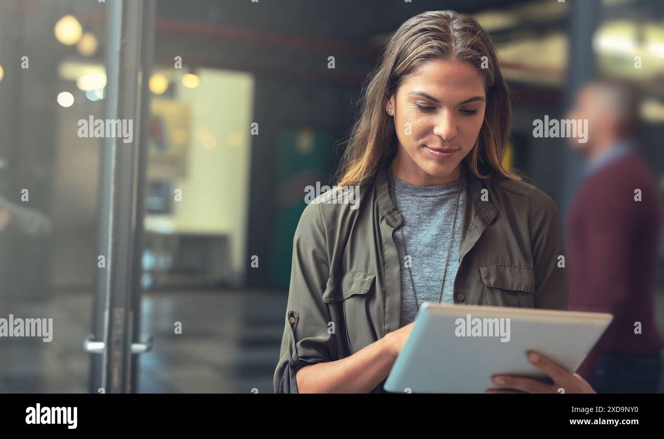 Woman, store manager and trade on tablet in mall, planning and app for ...