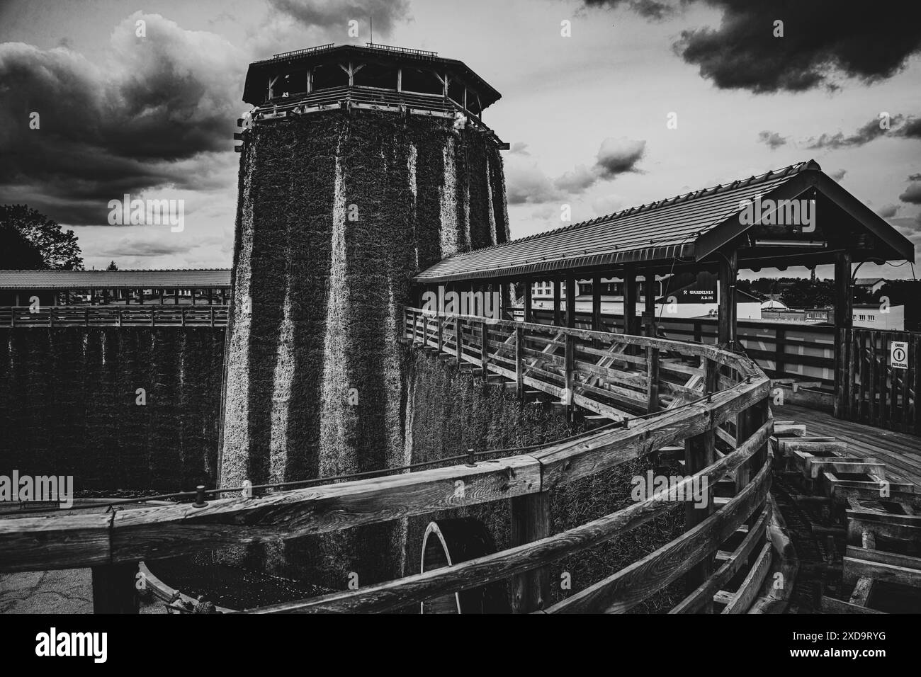 A historic salt tower with a wooden observation deck and a covered ...