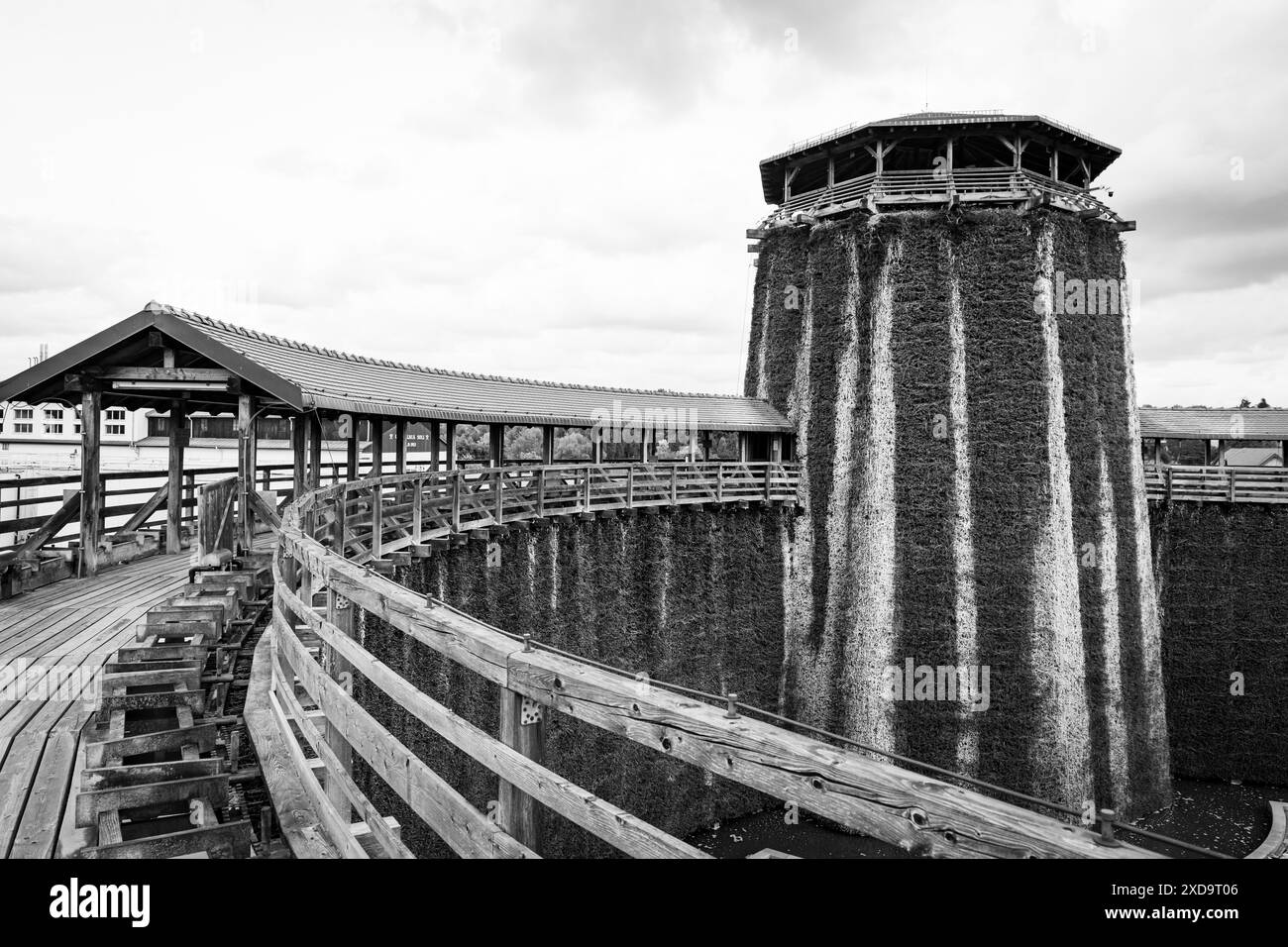 A historic salt tower with a wooden observation deck and a covered ...
