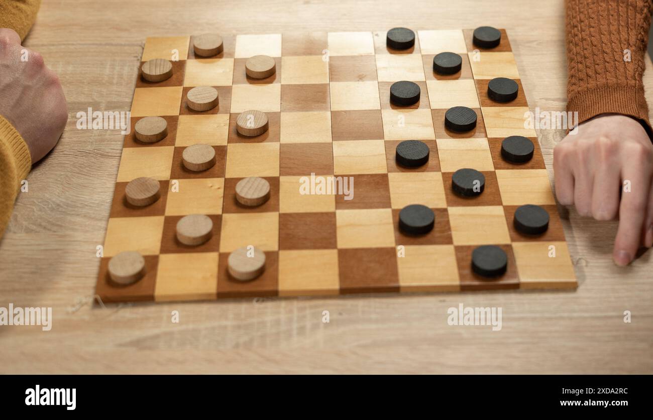 Draughts hand hi-res stock photography and images - Alamy