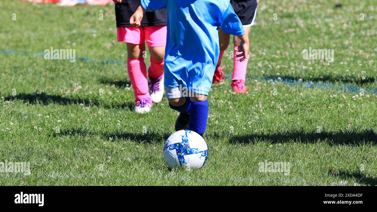 Child children playing running fun green grass hi-res stock photography ...