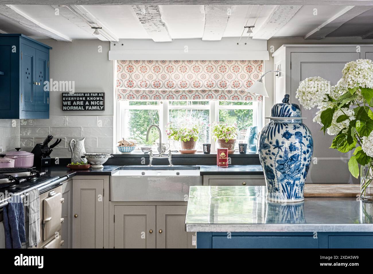 Tasha Textiles blinds with blue and white lidded jars from OKA in ...