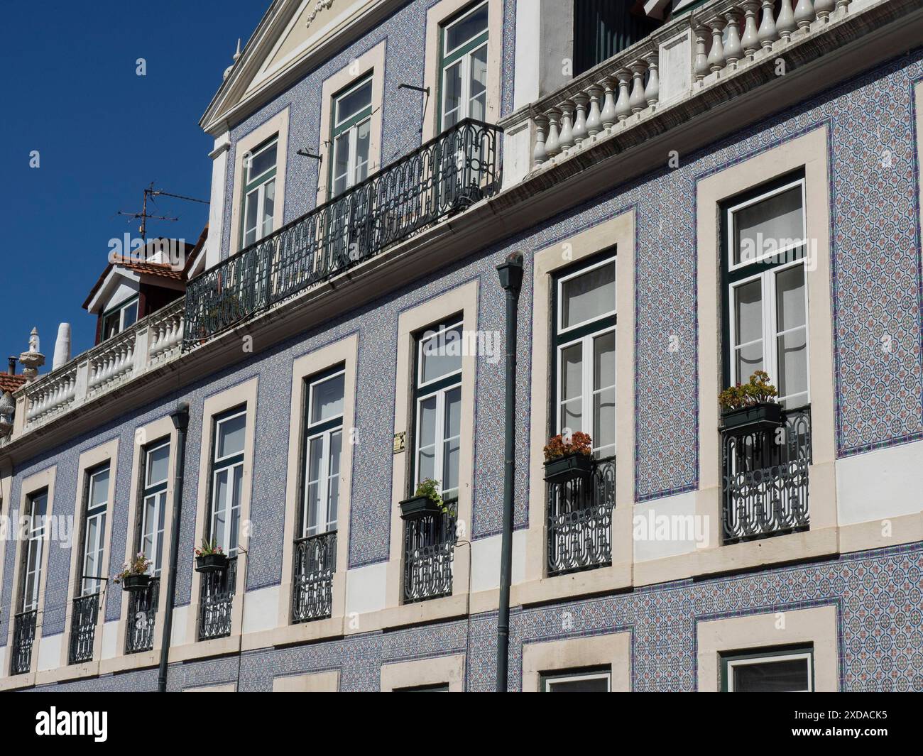 Building with detailed facades and balconies, decorated and standing ...