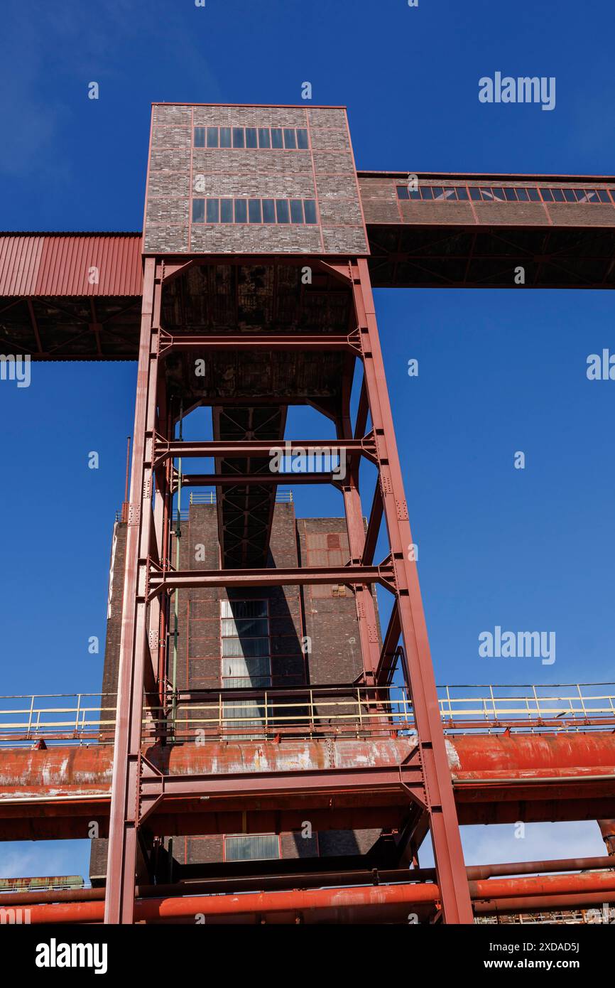 Large industrial tower made of bricks and steel on an industrial site ...