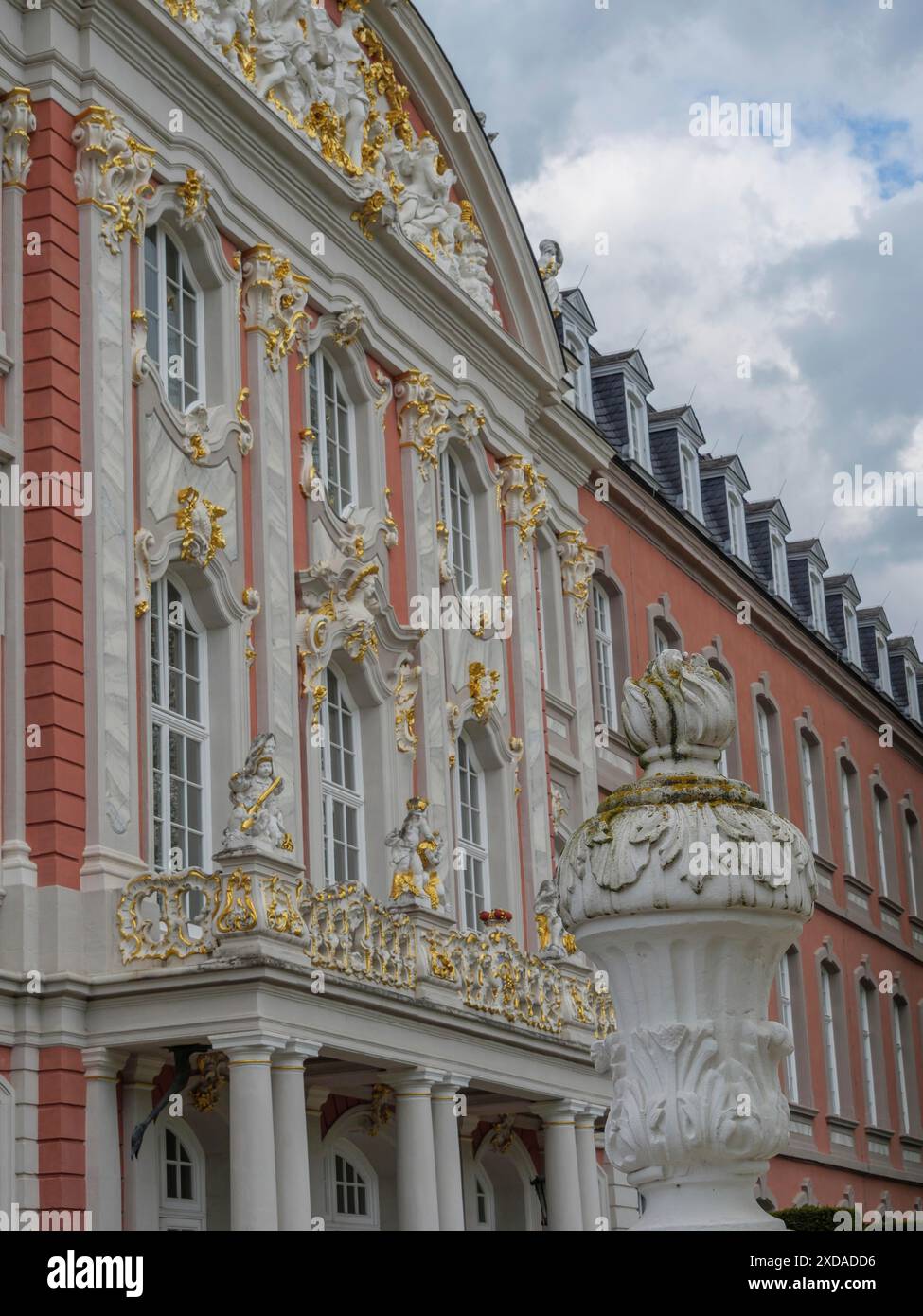 Detail of the richly decorated baroque facade of a historic building ...