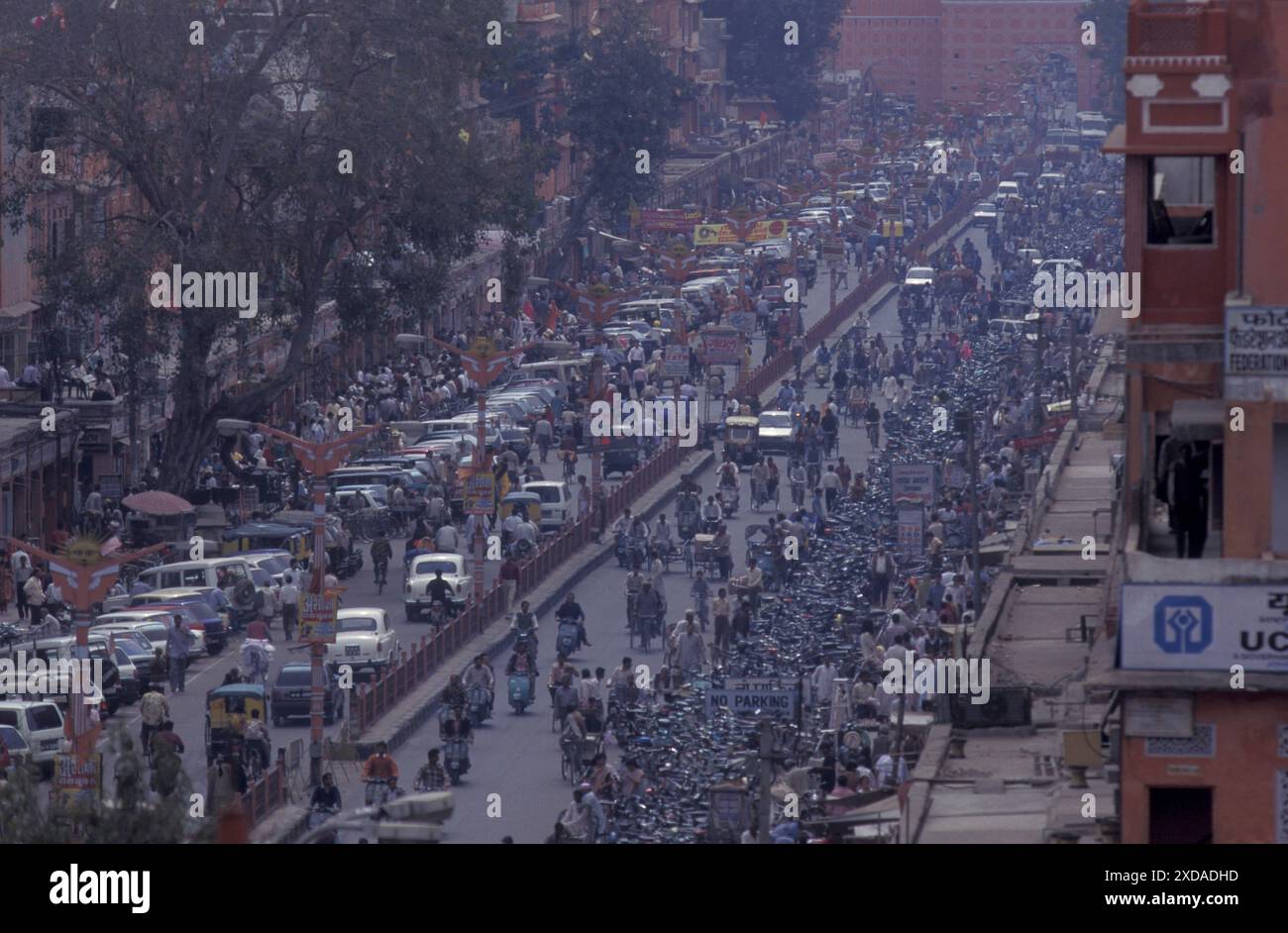Traffic and pollution with cars, bus amd motorcycle on a mainroad in ...
