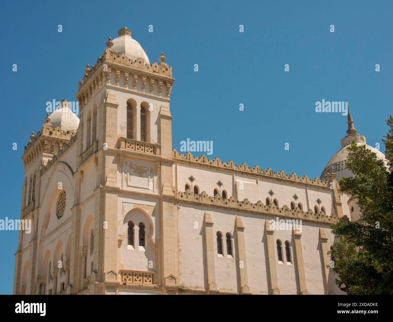 Historic church building with domes and windows in front of a blue sky ...