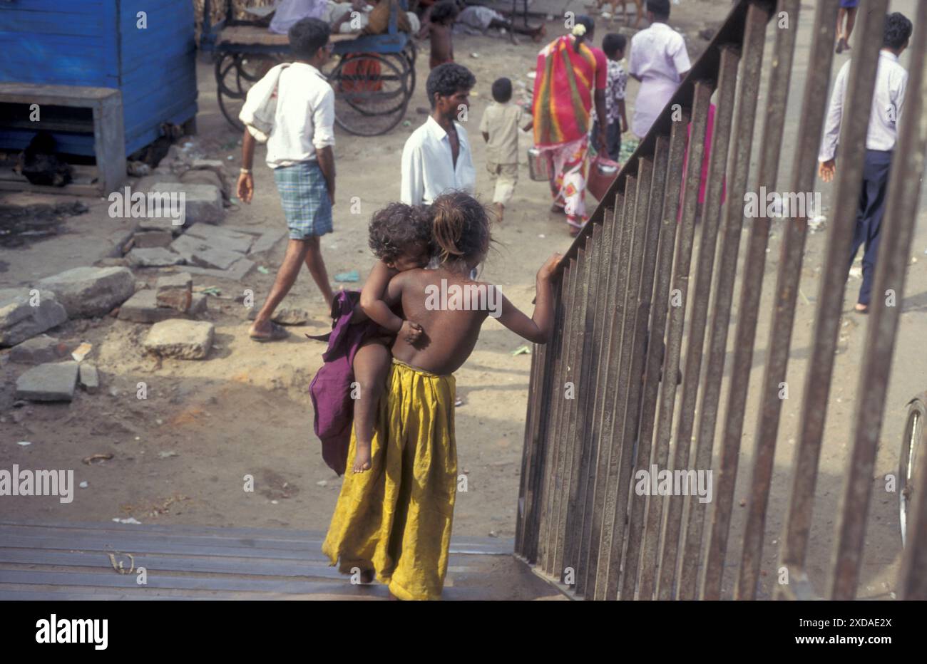 poor children at a Streetmarket and alley in the city of Chennai in ...