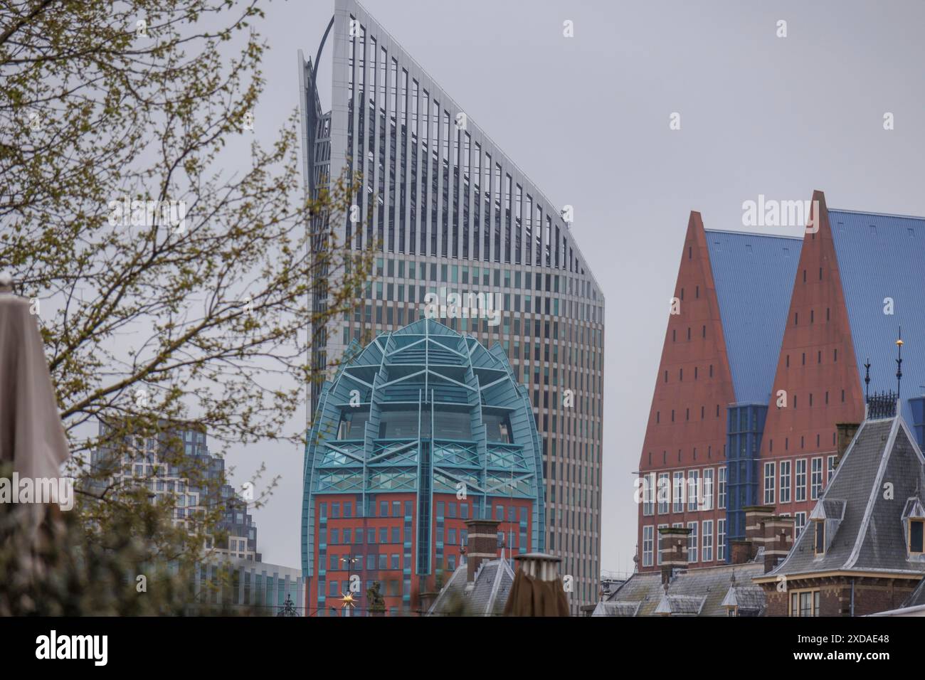 Modern high-rise buildings with glass facades and unique architecture ...