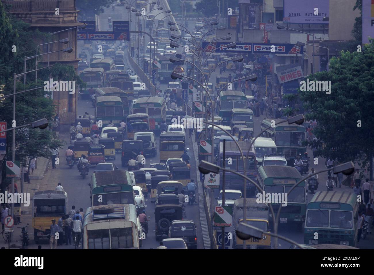Traffic and pollution with cars, bus amd motorcycle on a mainroad in ...