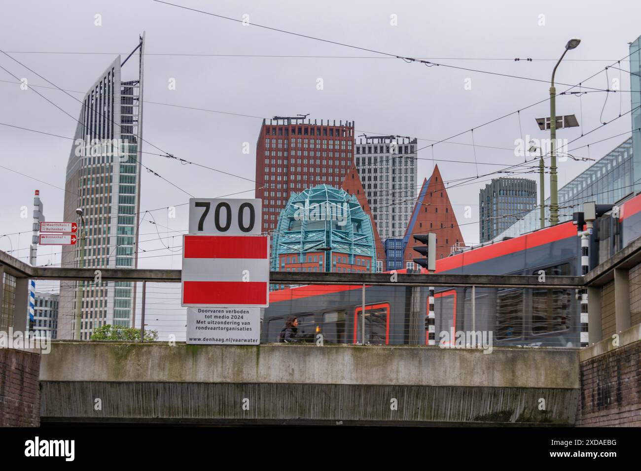Urban landscape with modern high-rise buildings and tram lines in ...