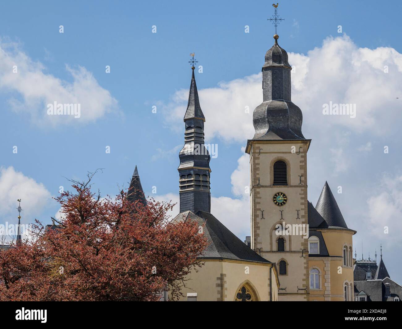 Church tower of a historic building with decorative elements and ...