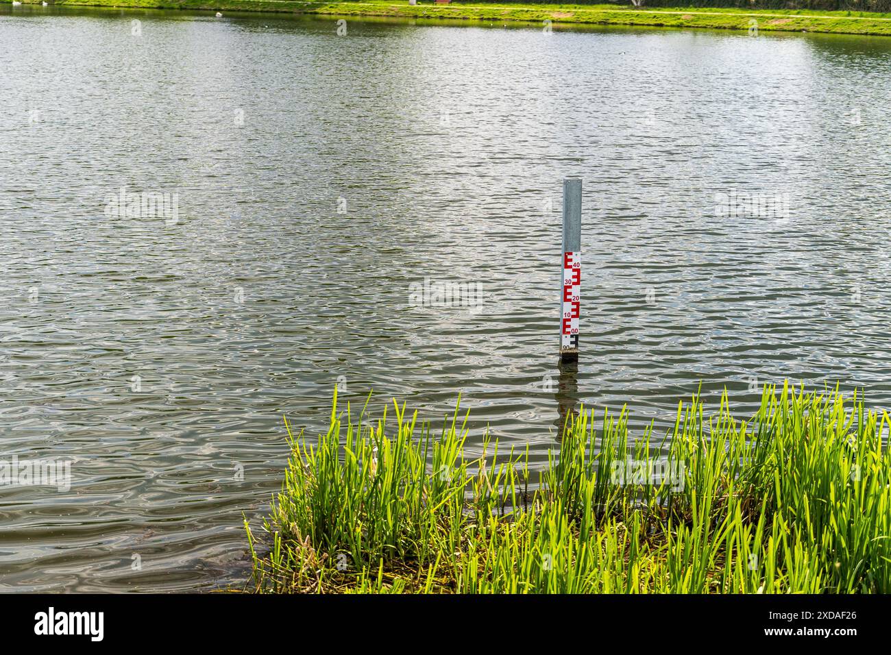 Lake water level sign in Falenty, Poland. Water level depth meter in ...