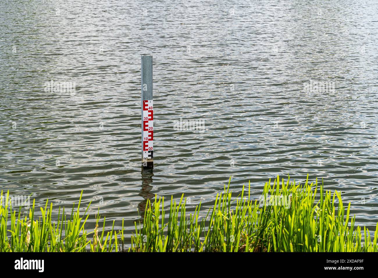 Lake water level sign in Falenty, Poland. Water level depth meter in ...
