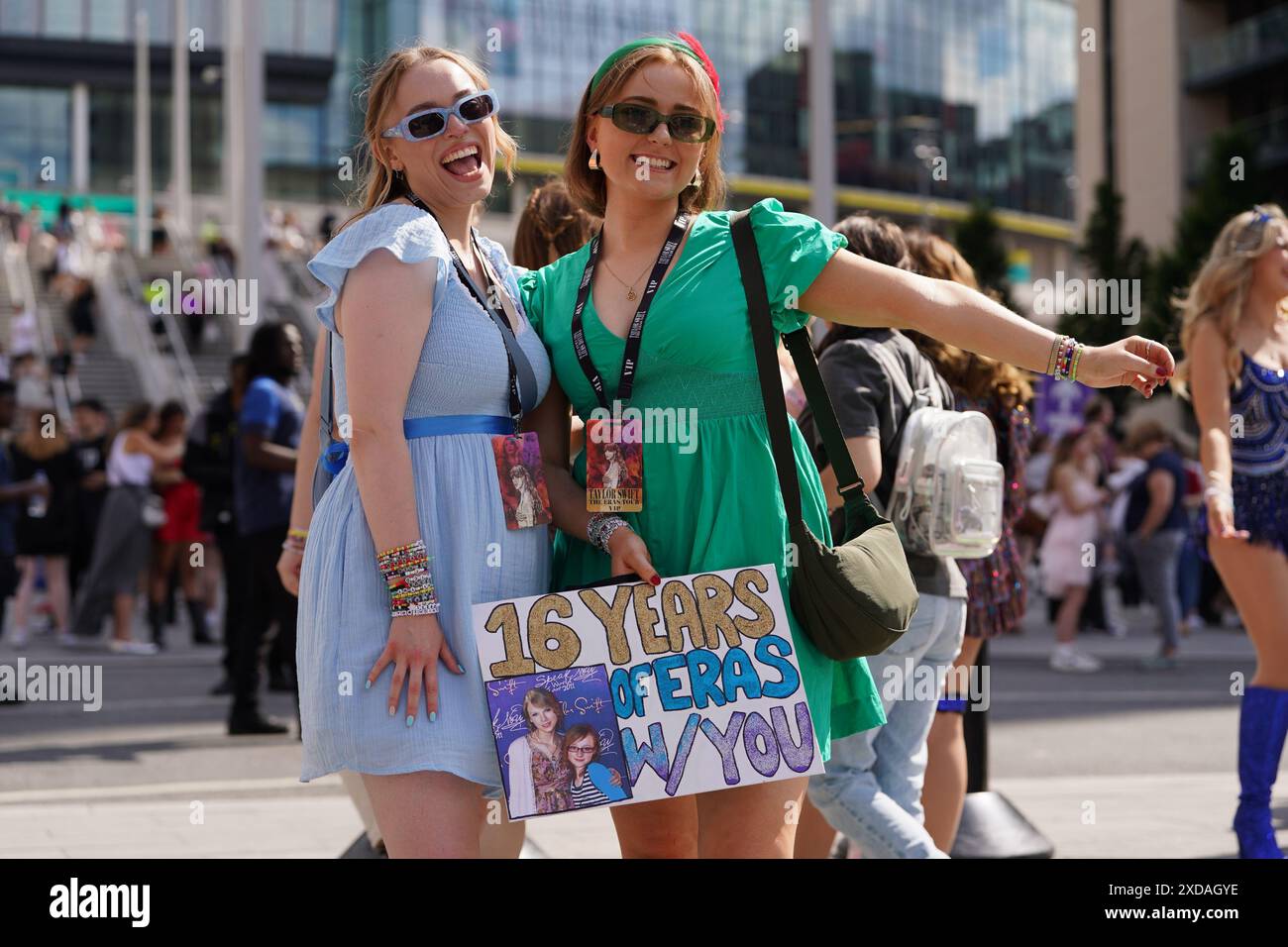Fans wait outside Wembley Stadium in London, ahead of Taylor Swift's ...