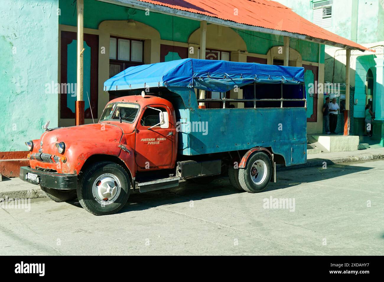 Baracoa, Cuba, Central America, Old lorry with red and blue roof plots ...