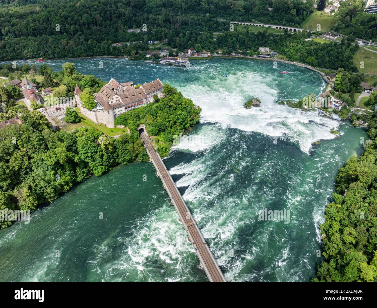 Aerial view of the Rhine Falls with railway viaduct and Laufen Castle ...