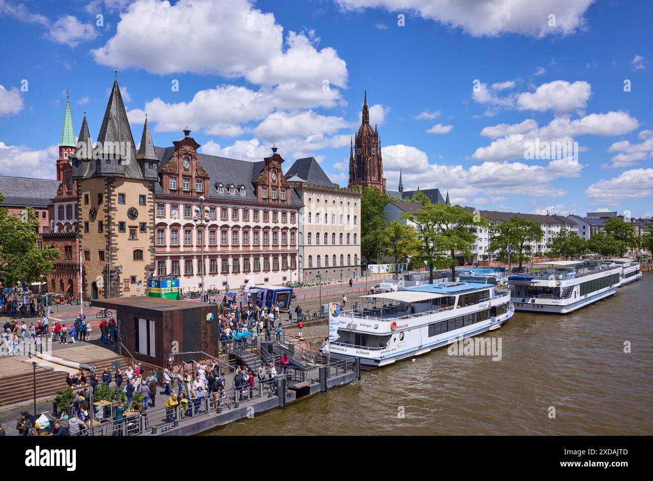 Saalhof with rent tower and excursion boats at the Mainkai under a blue ...