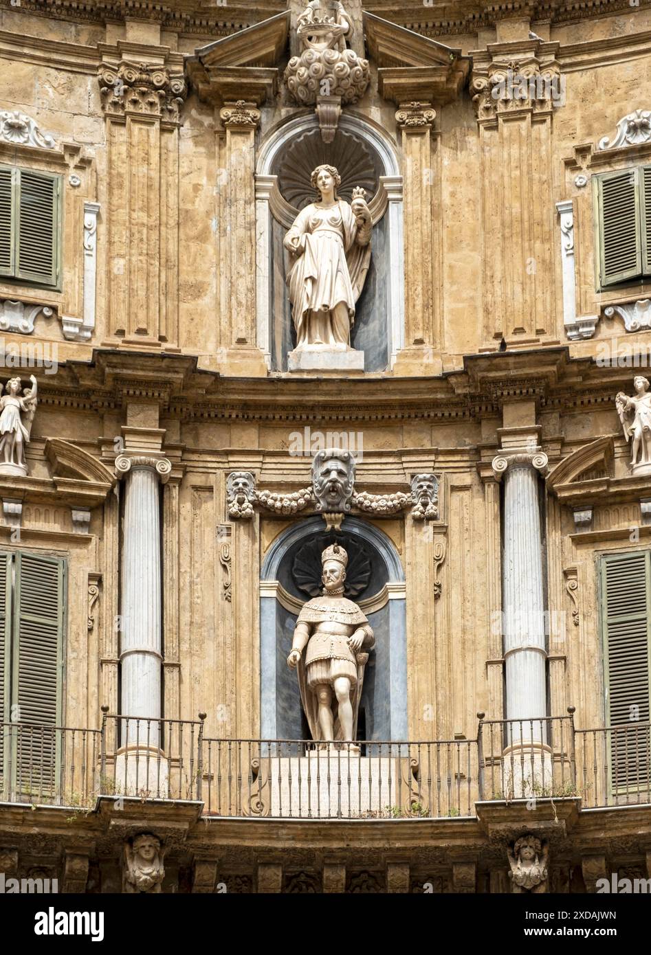 Facade representing summer season with statues of Philip II and Santa ...