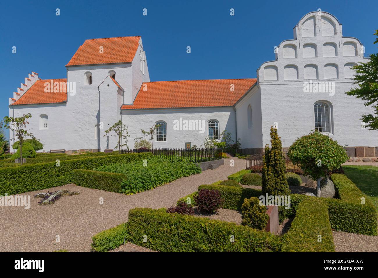 Typical Danish church with Renaissance gable in Hesselager, whitewashed ...