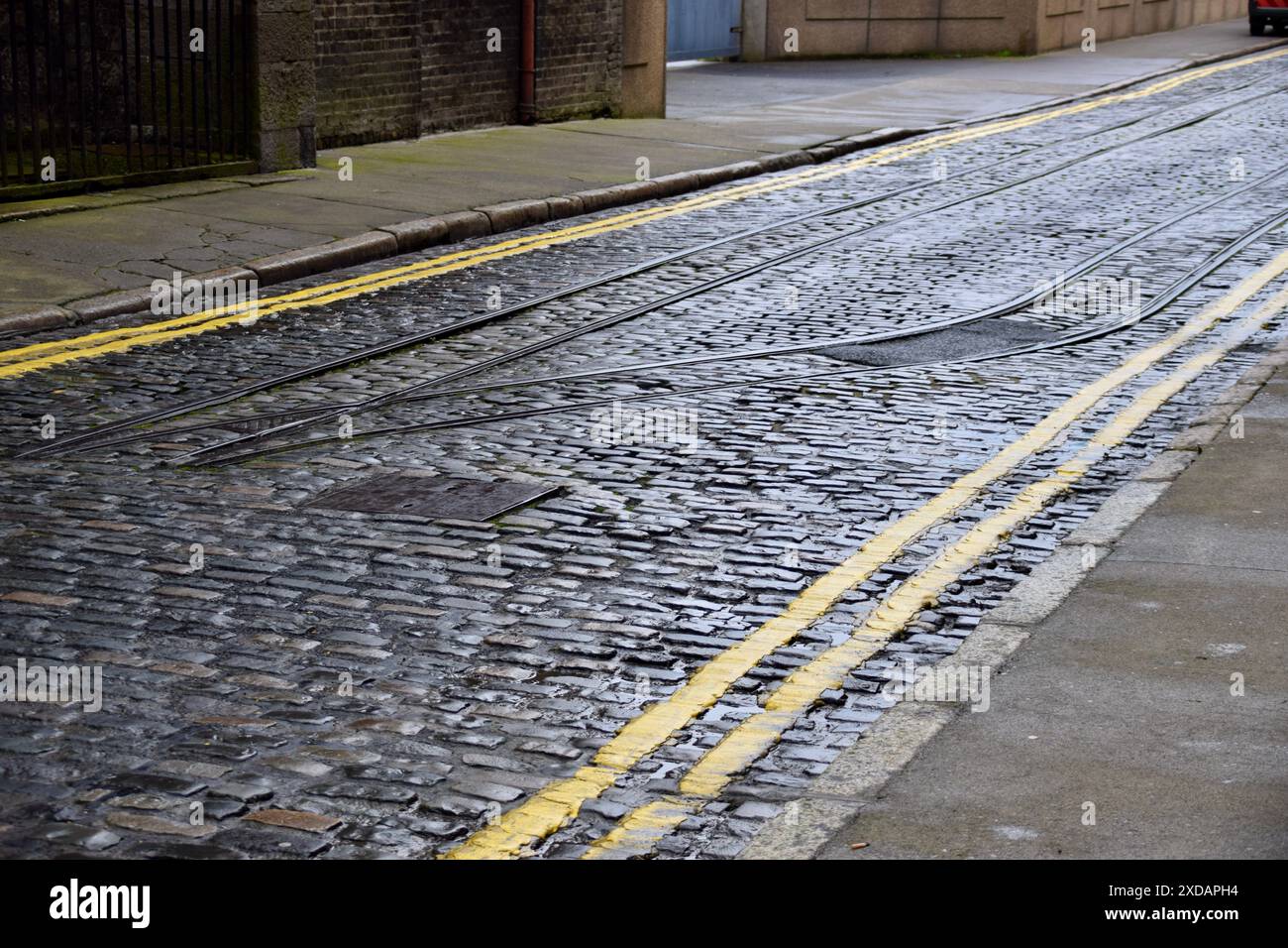 Vintage Train Tracks on a cobbled street in Dublin, Ireland. Double ...