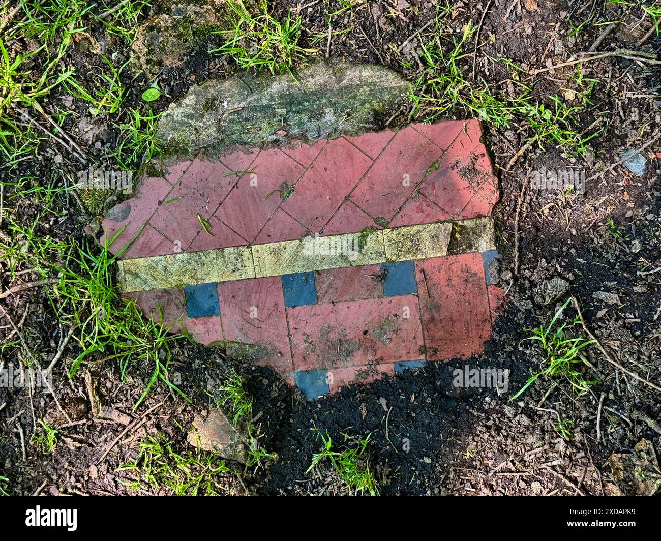 A section of tiled floor uncovered in a field Stock Photo - Alamy