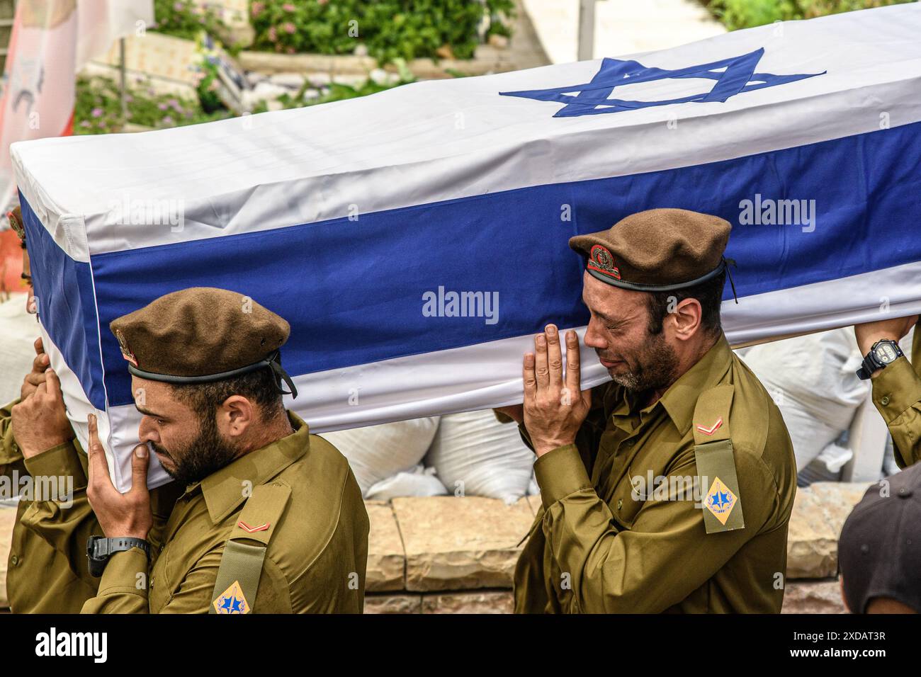 Israel. 21st June, 2024. An IDF reservist burst into tears as he the ...