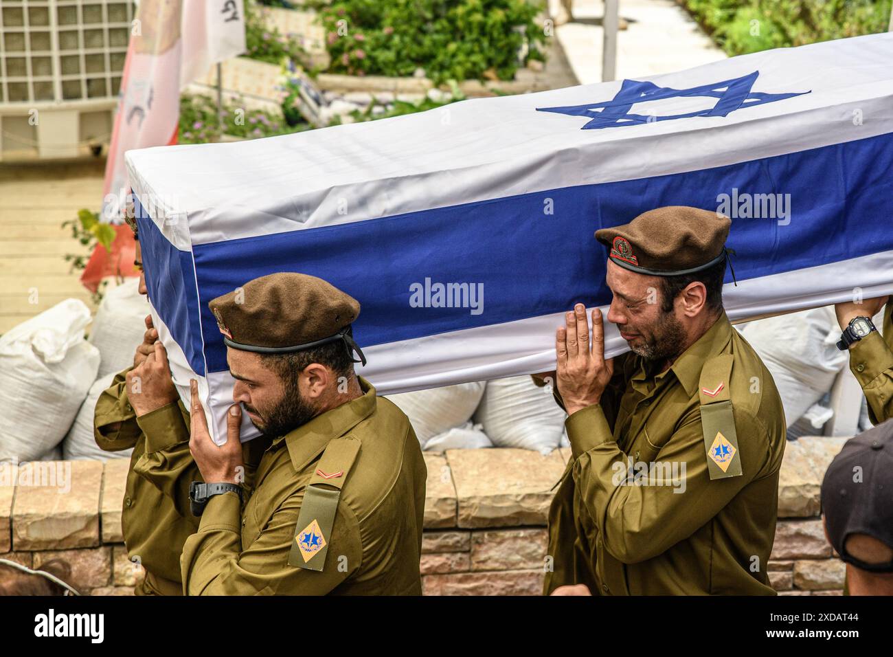 Israel. 21st June, 2024. An IDF reservist burst into tears as he the ...