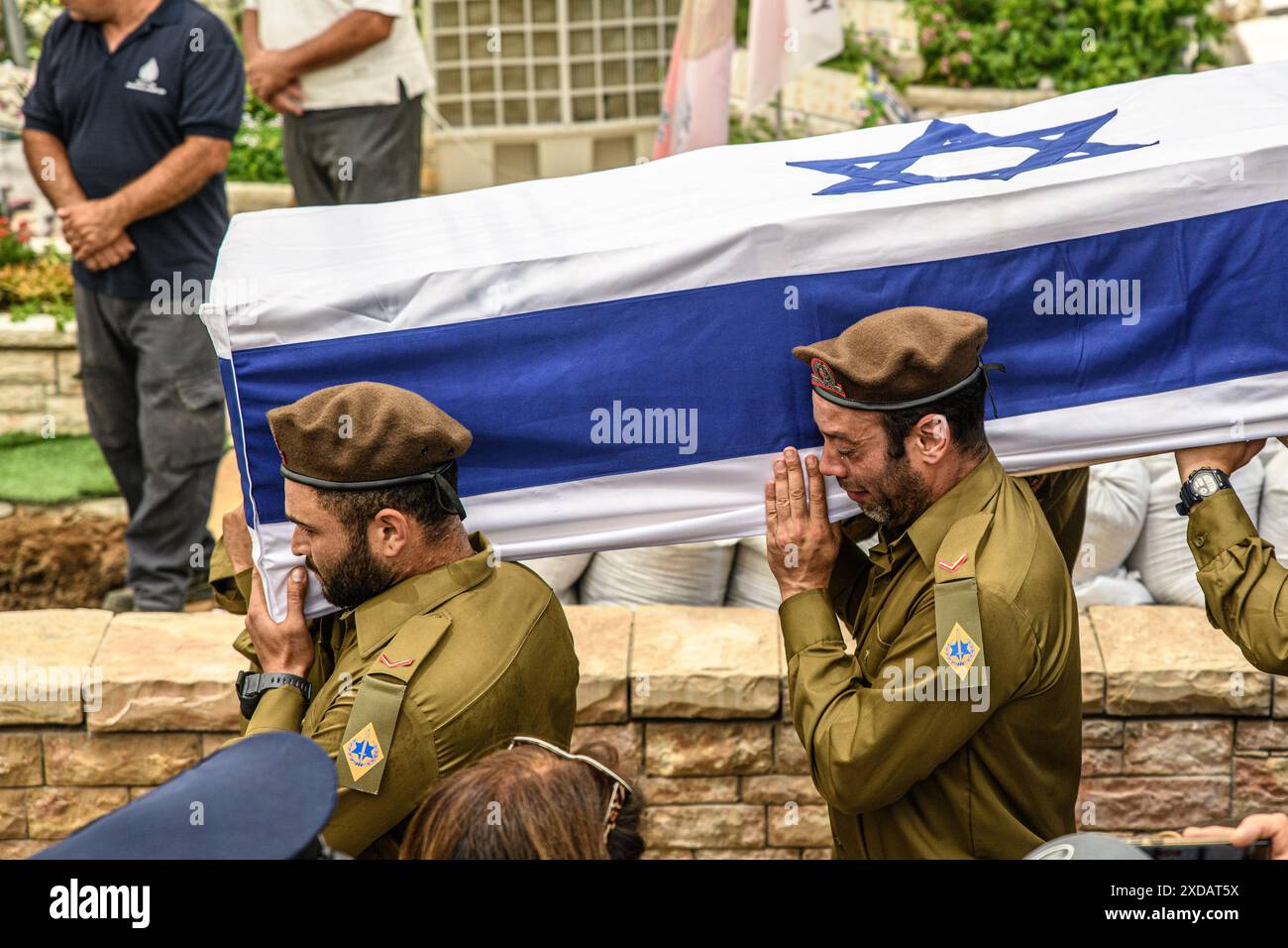 Israel. 21st June, 2024. An IDF reservist burst into tears as he the ...
