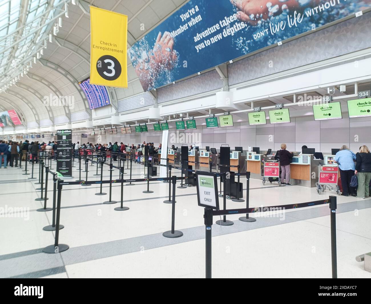 Toronto, ON, Canada - June 21, 2024: Inside view of the Toronto Pearson International Airport ...
