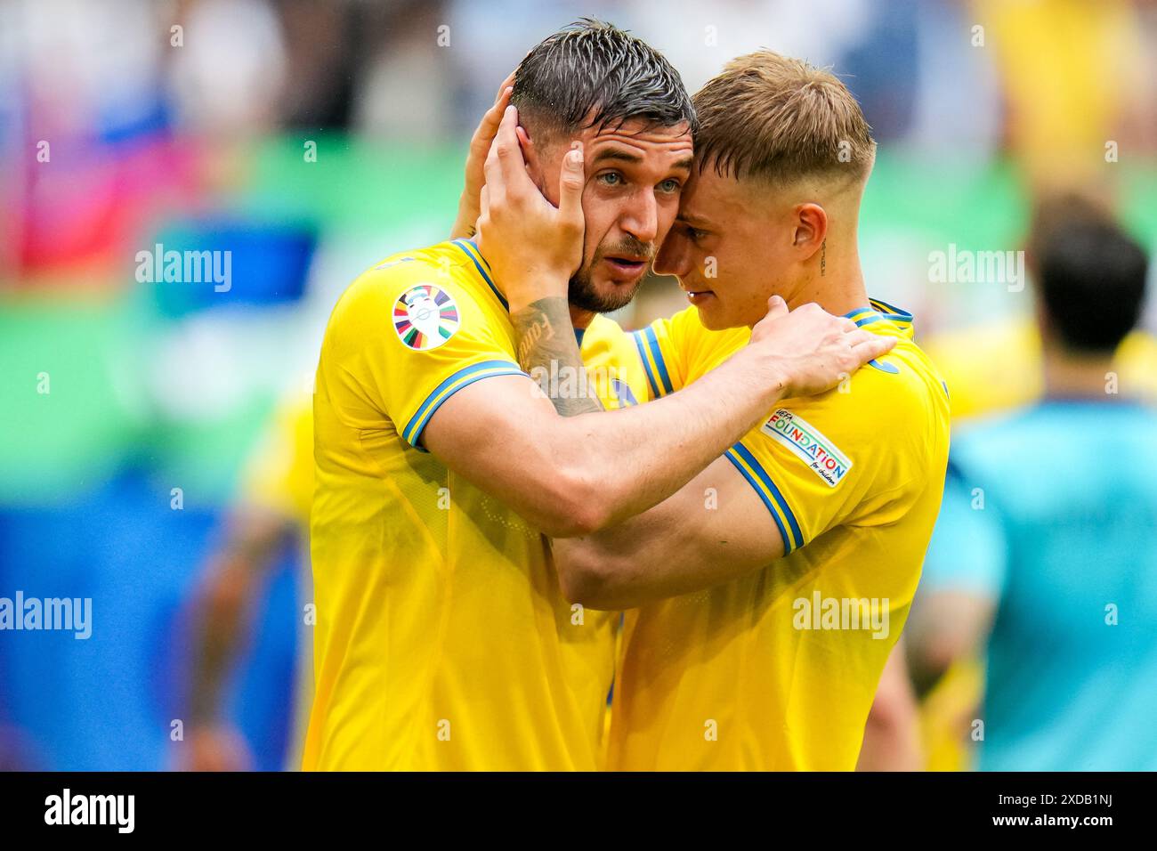 DUSSELDORF, GERMANY - JUNE 21: Roman Yaremchuk of Ukraine and Volodymyr ...