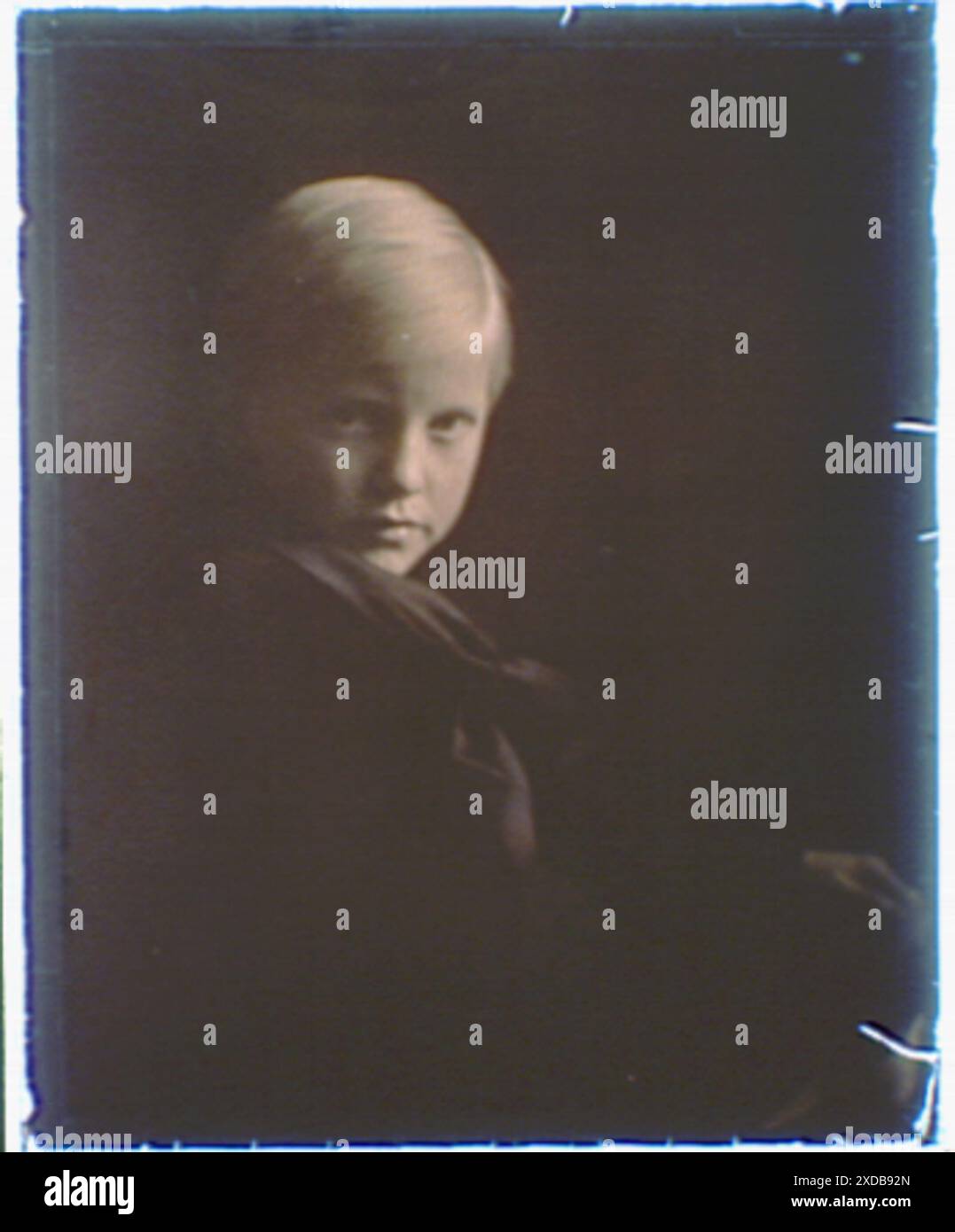 Boy with blonde hair dressed in black. Genthe photograph collection ...